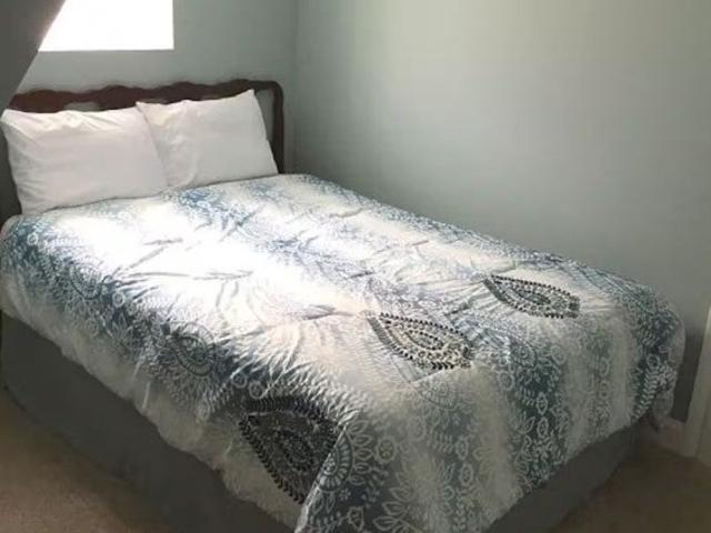 Spacious furnished room with a private bathroom