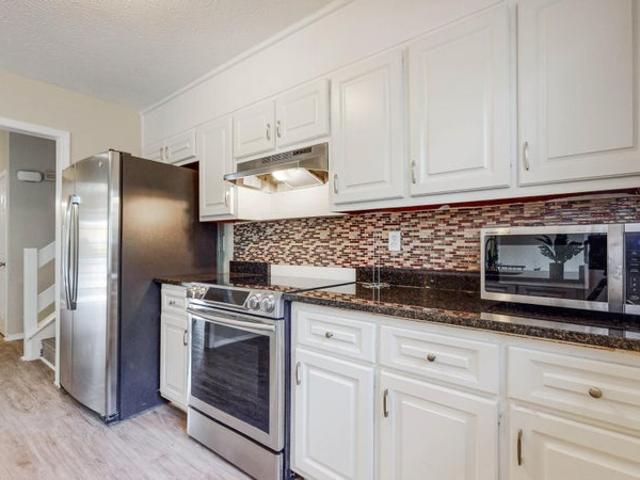 Spacious Home with Yard & Close to Parks & Shoppi