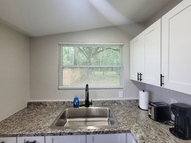 Spacious & homey Gainesville House with Workspace