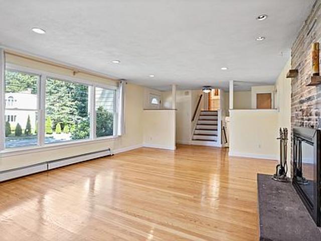 Spacious multi level single family abutting conser