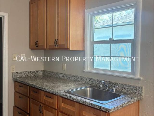 Spacious One Bedroom Duplex with large front yard! Available now