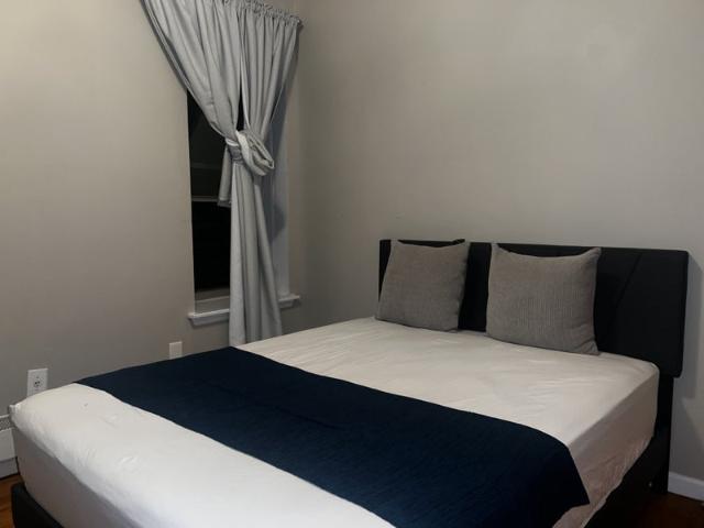 Spacious Room with Private Bath & AC in Family Hom