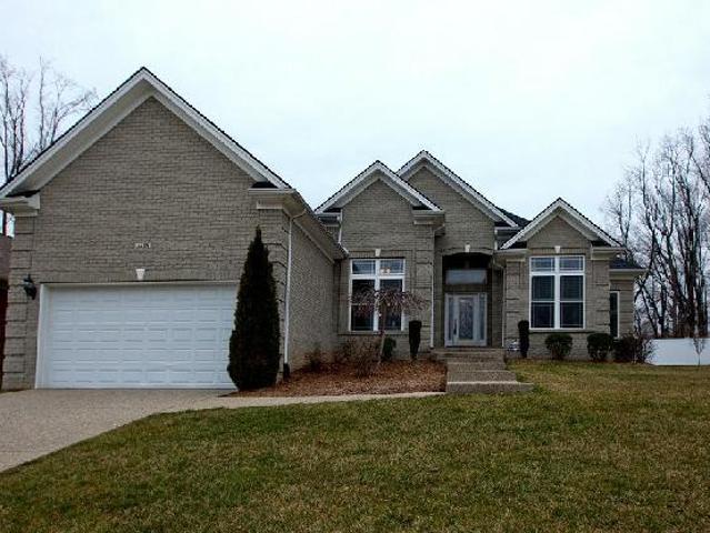 Sprawling Brick Ranch Featuring Great Room with Fireplace