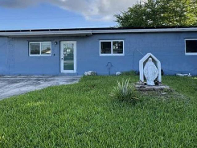 SW 266th St