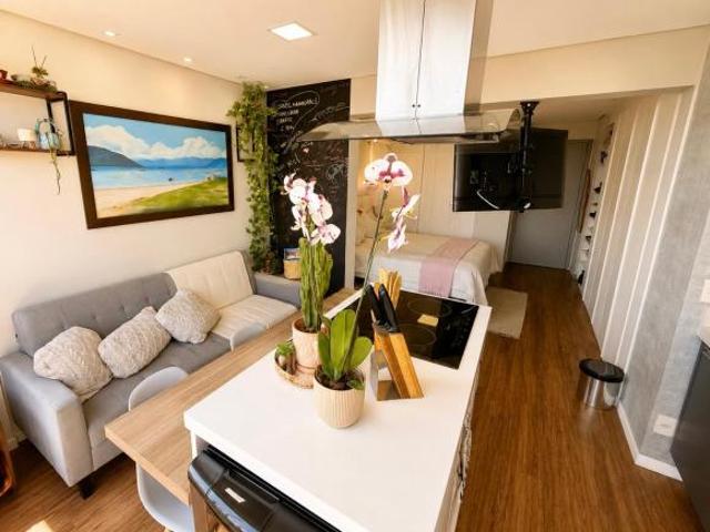 Studio de 33 m² com projeto inteligente, moderno e aconchegante, que aproveita c