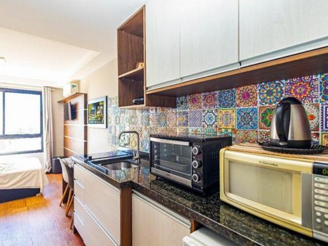 STUDIO TOTALMENTE MOBILIADO A VENDA NO CENTRO