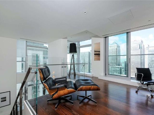 Stunning 2 bed, 2 bath apartment set out over the 38th & 39th floors in this prestigious development in Canary Wharf