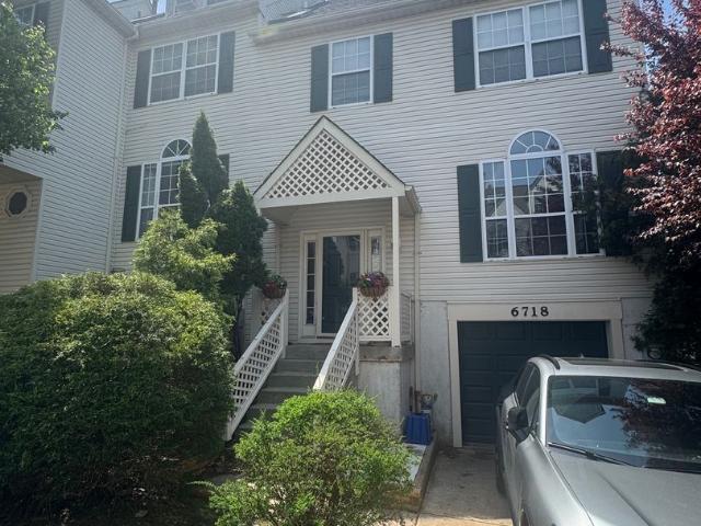 Stunning 3–4 Bedroom Townhome in Private Community | Garage + EV Charger | Deck with Tree Views