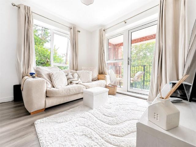 Stunning two bedroom apartment with two bathrooms, an open plan kitchen/living space, and two allocated parking spaces