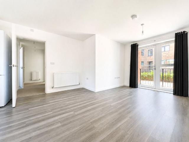 Stunning two bedroom apartment with two bathrooms, an open plan kitchen/living space, and allocated parking