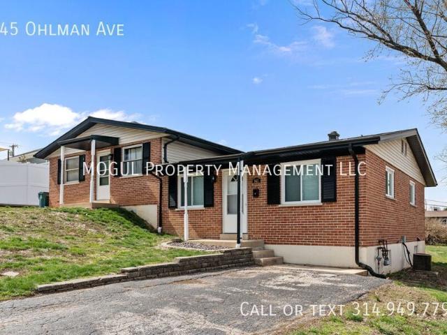 Stunning Brick Duplex with private partially finished basement in Kirkwood