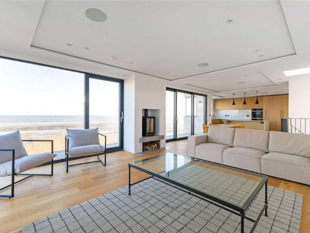 Stunning coastal new build house overlooking Pett Level Beach with panoramic sea views