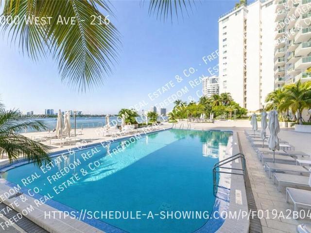 Stunning One Bedroom, One Bathroom Bayfront Oasis: Unobstructed Sunset & Skyline Views, Elite Resort Amenities & Direct Access To West Avenue