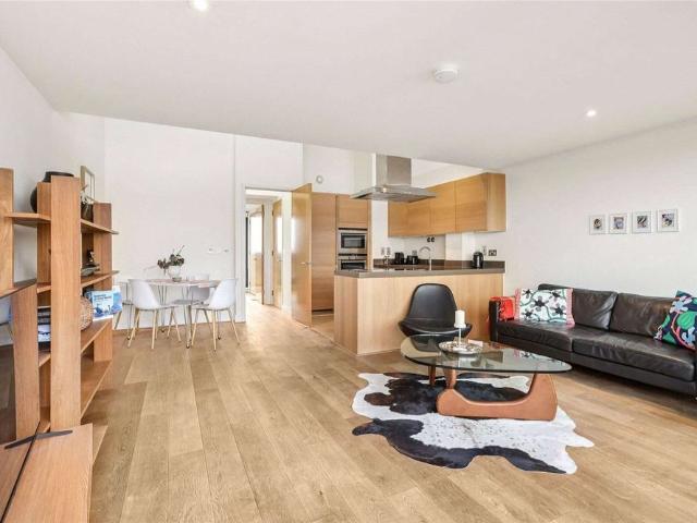 Stylish two bedroom penthouse, offering river views & off street parking