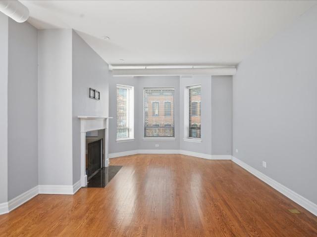 Sun Filled 2BR River North Condo – Ensuite Baths, In Unit W/D