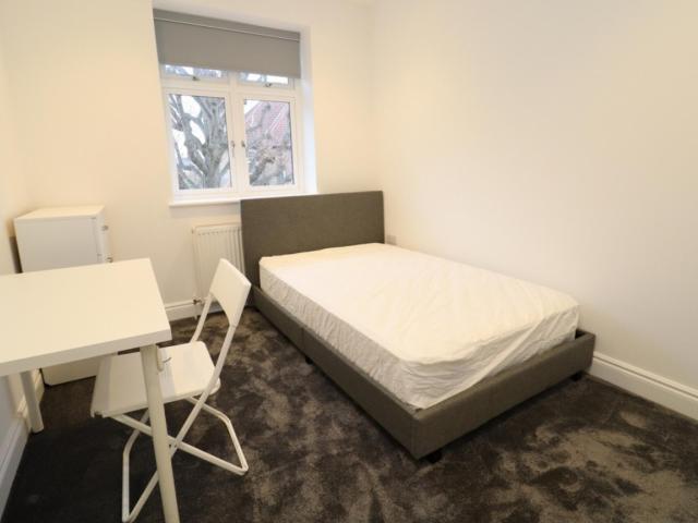 Sung double bedroom near the Bush Hill Park train station Has a Room