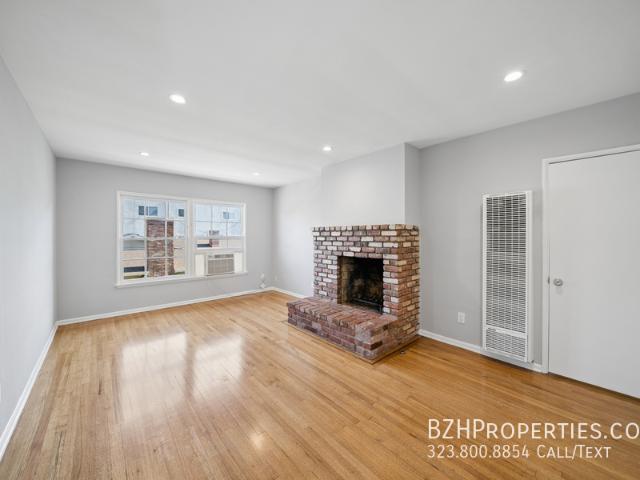 Sunny First Floor Apt with Fireplace and Pet Friendly Living