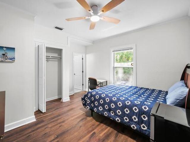 Super Host Steps From Blanding and Timuquana! Renovated • Clean • Convenient EN SUITE BATHROOMS Each Room Includes a TV, Mini Fridge, Desk, and More!