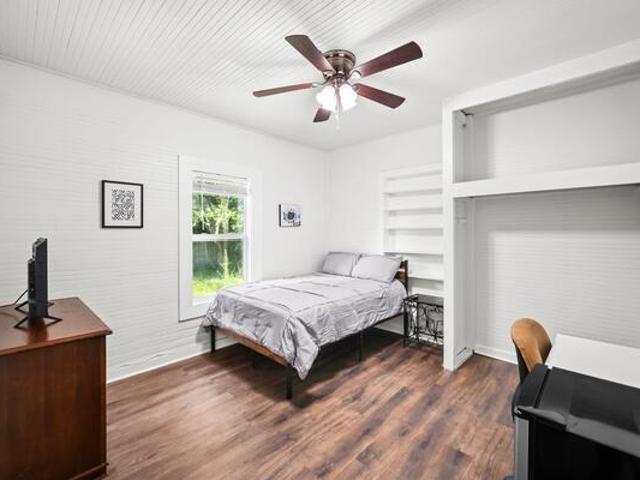 Super Host Steps From Blanding and Timuquana! Renovated • Clean • Convenient EN SUITE BATHROOMS Each Room Includes a TV, Mini Fridge, Desk, and More!