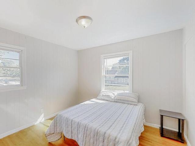 SuperHost* Beautiful home near Mt Zion Blvd with Spacious Bedrooms, Free WiFi, 50 inch TVs in every room, Monthly Cleanings and a Bright & Airy Feel! Come Relax Today!